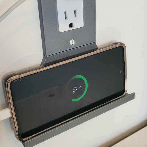STL file Wall outlet plate with Vertical cell phone charging support ...