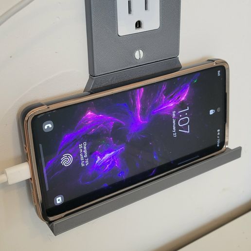 STL file Wall outlet plate with Vertical cell phone charging support ...