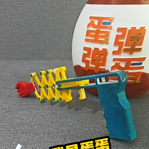 🤜 Retractable Fist Toy by EggJoy・ STL File for 3D printing・Cults
