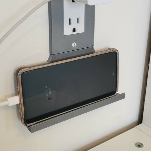 STL file Wall outlet plate with Vertical cell phone charging support ...