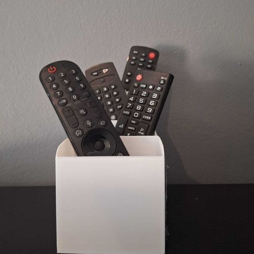 Archivo STL Remote Holder with Multiple Slots 🏢 ・Diseño de impresión en ...