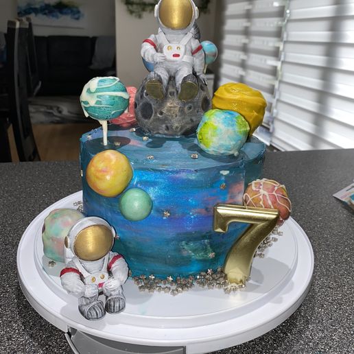 3D printed Astronaut sitting on the moon printable model • made with ...