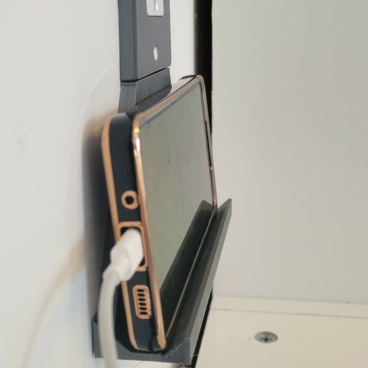 STL file Wall outlet plate with Vertical cell phone charging support ...