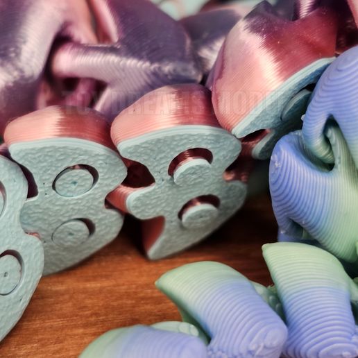 Archivo STL Cartoon Flexible Octopus Cute Tiny Articulated Toy 🐙 (3MF ...