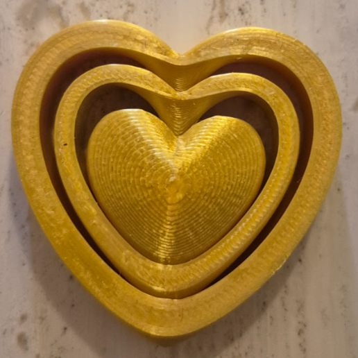 STL file Spinning Heart Fidget 💜 ・3D printer design to download・Cults