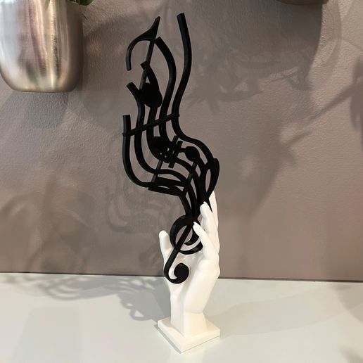 🗿 Harmonious Touch: A Symphony in Sculpture - Musical Hand Art ...